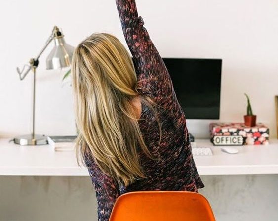 Stiff at work? Here's how to live your best desk yoga life