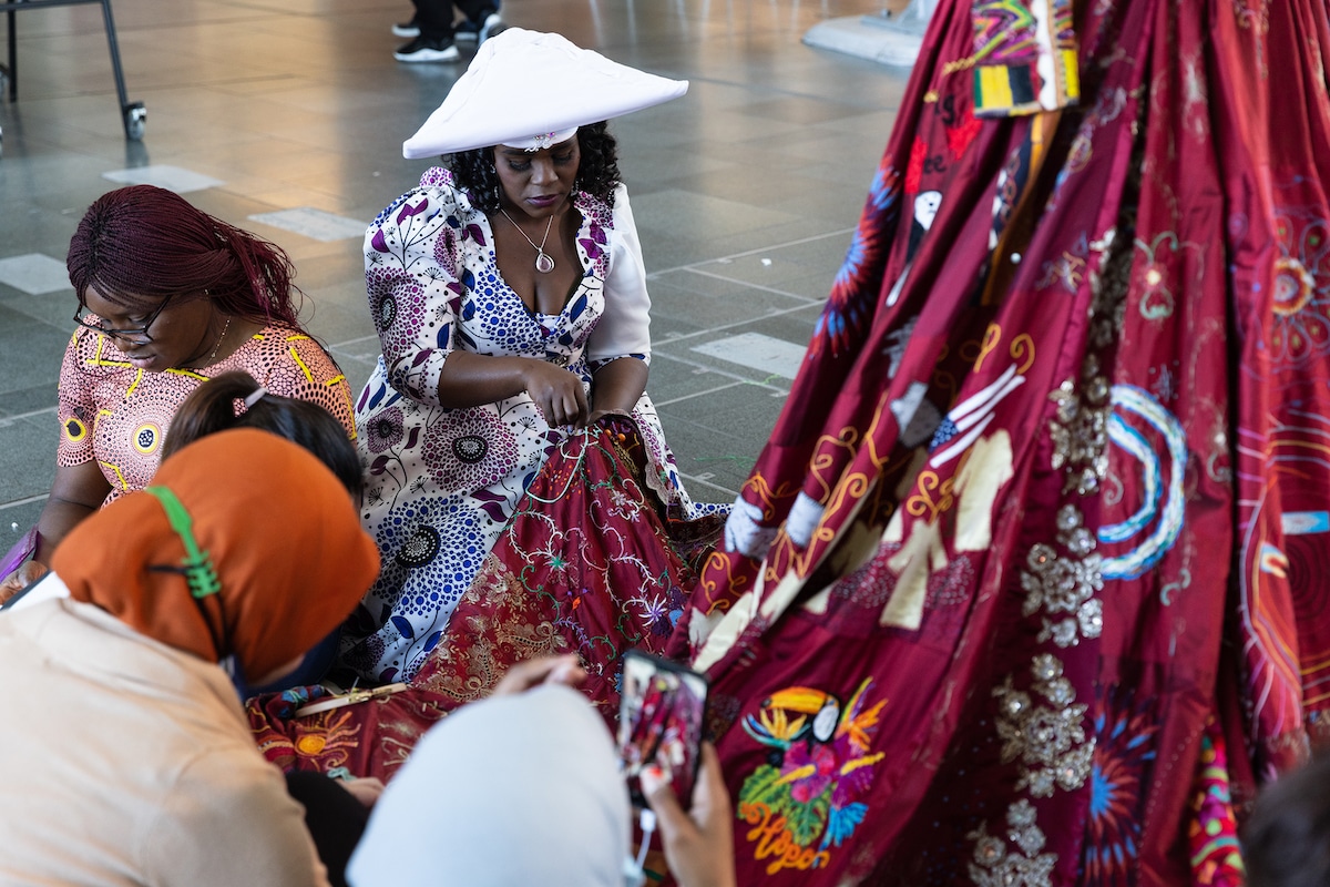 This ornate red dress took 13 years and 353 artists in the making